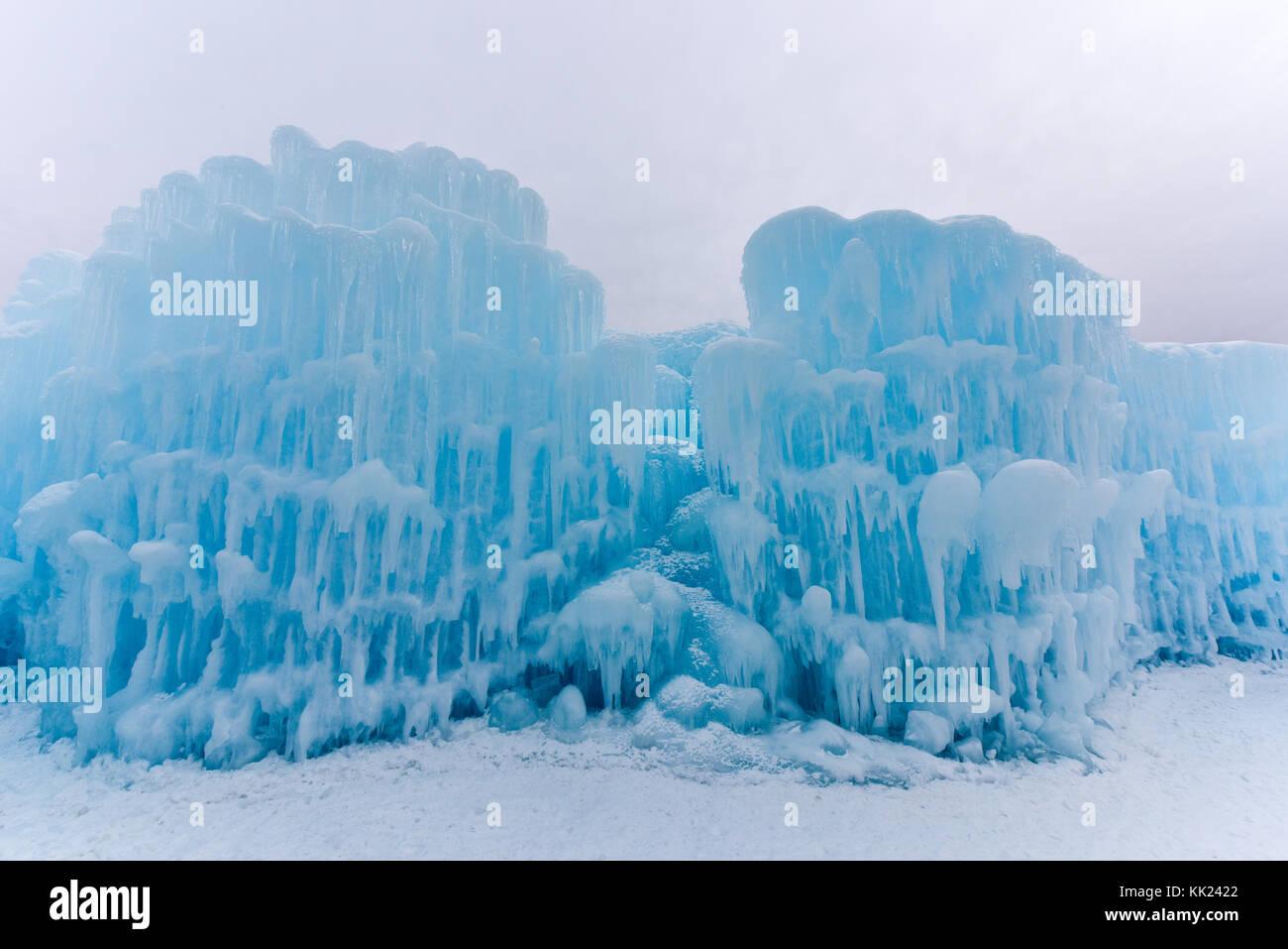 Translucent blue icicles in a frozen ice wall Stock Photo - Alamy