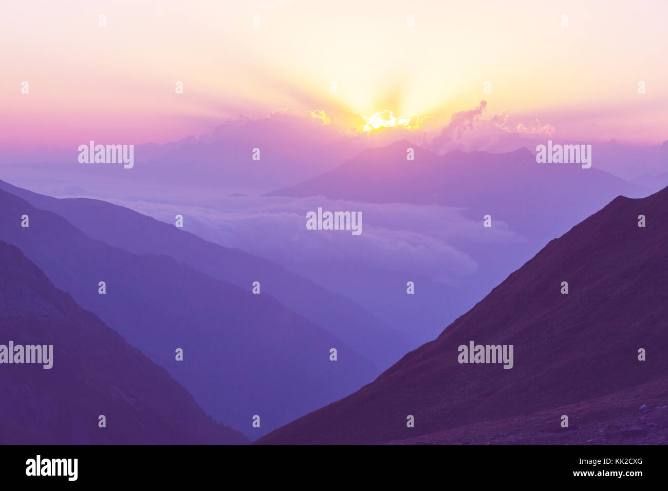sunset in mountains Stock Photo - Alamy