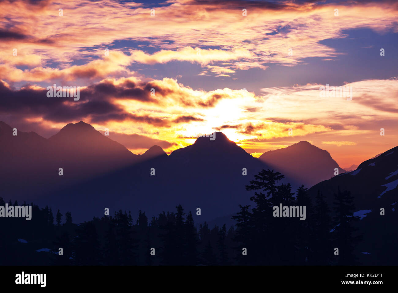 Scenic Sunset in the mountains Stock Photo - Alamy