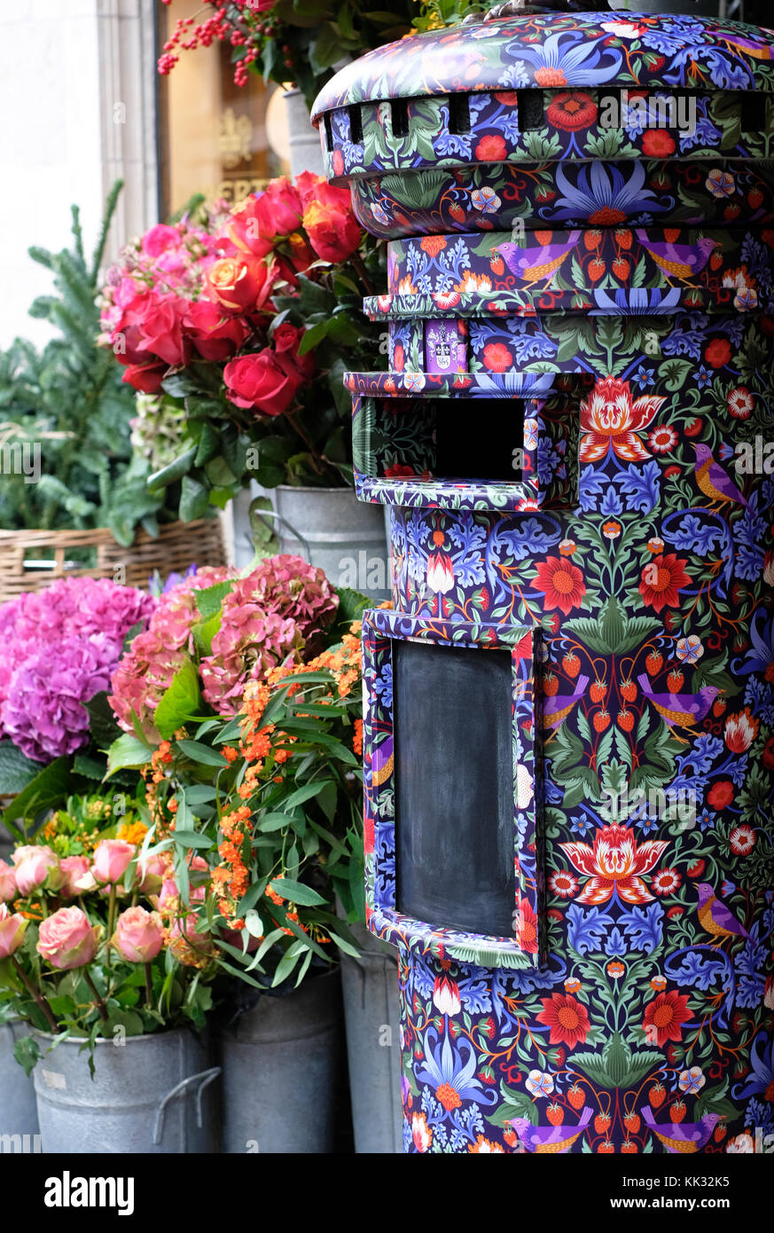Close up of post box covered in Liberty print, located in the flower ...