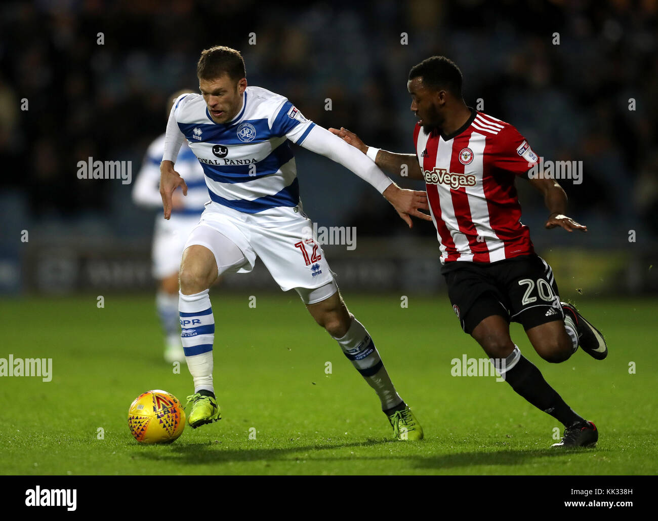 Queens Park Rangers' Jamie Mackie (left) and Brentford's Josh Clarke ...