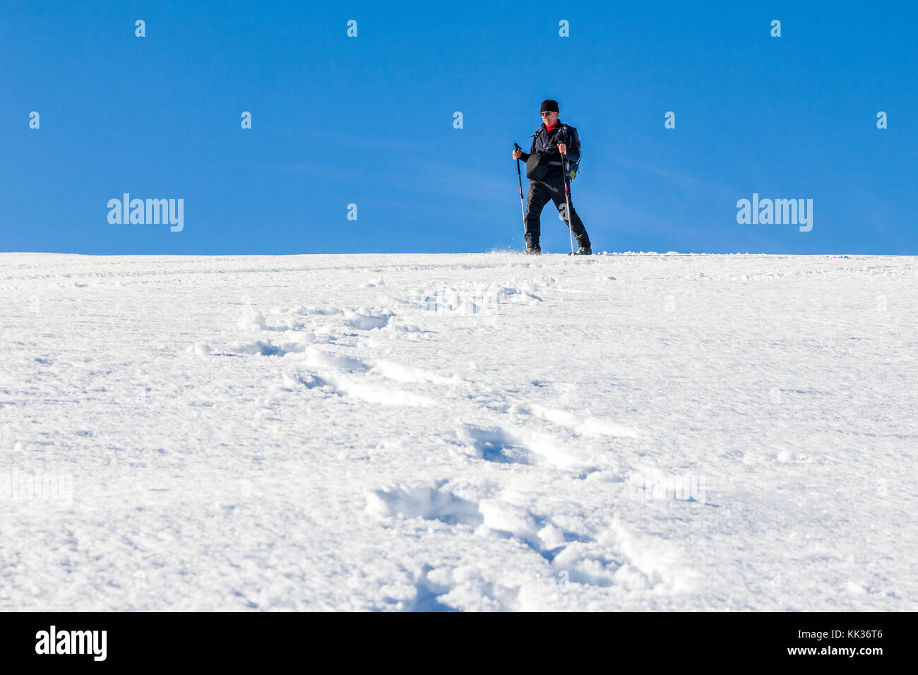 Snowshoe hiker on way hi-res stock photography and images - Alamy