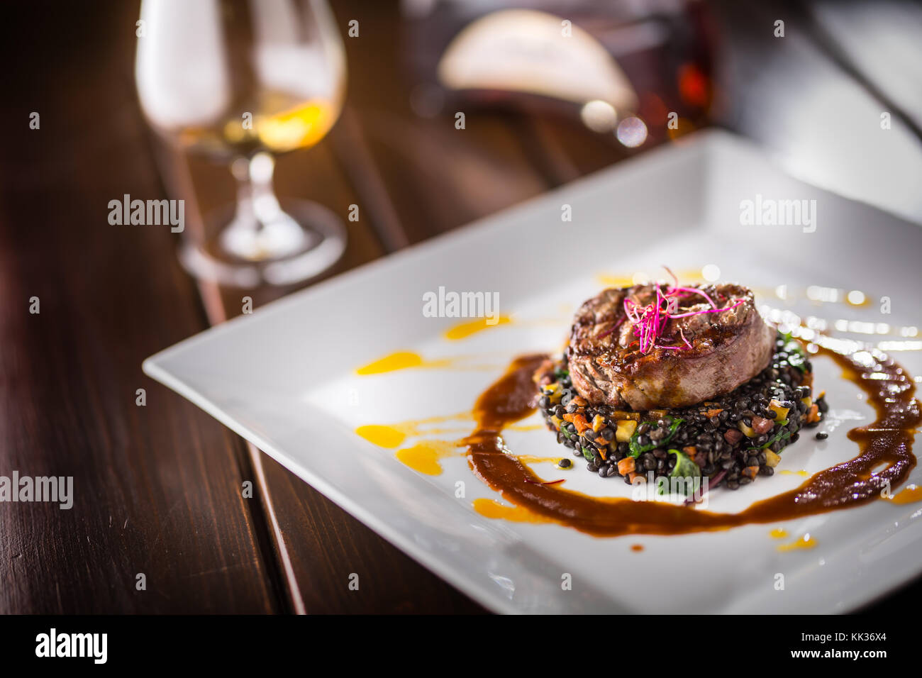 Beef Steak. Grill beef steak black lentils mixed with vegetable. Cognac ...