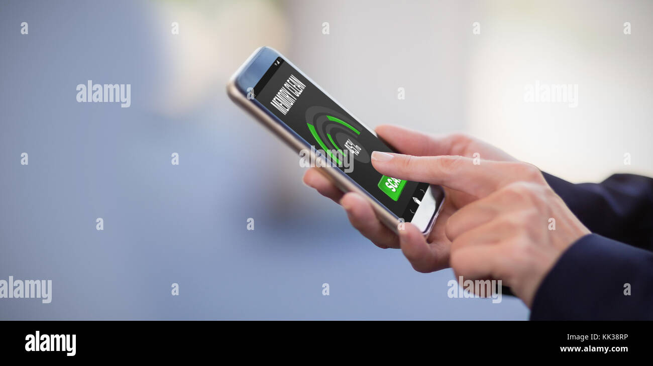 Mobile display with memory cleaner against businesswoman using mobile ...