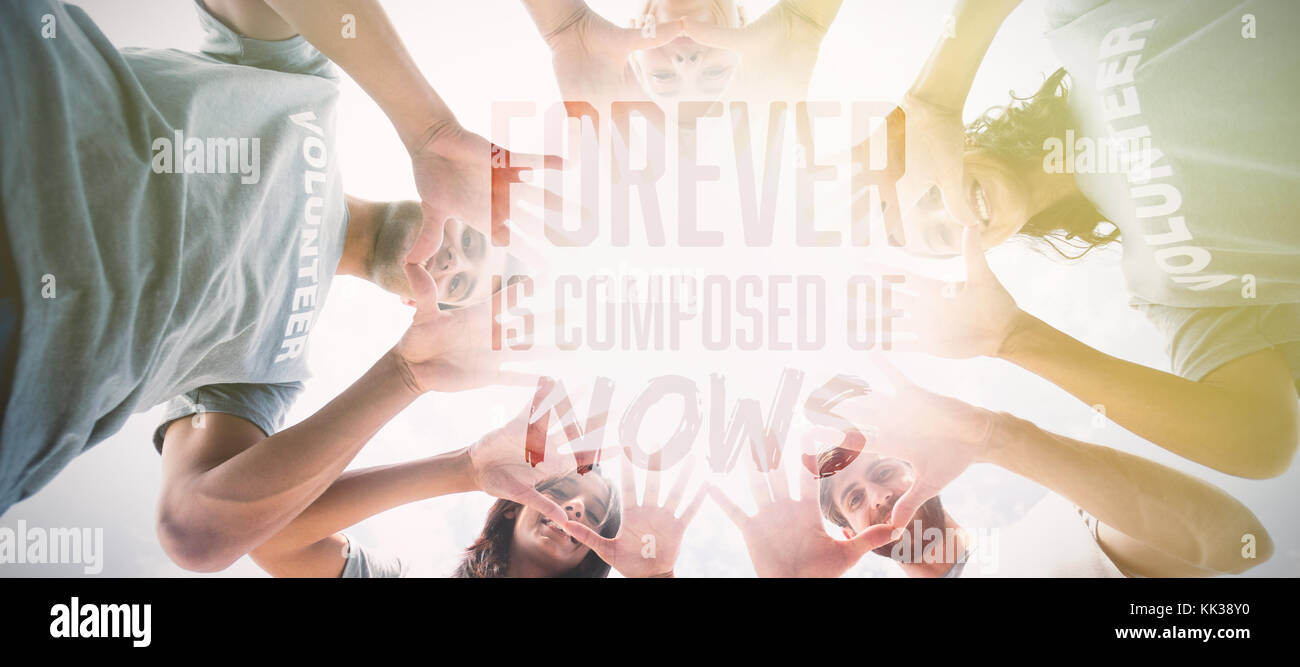 Friends putting their hands together against forever is composed of ...