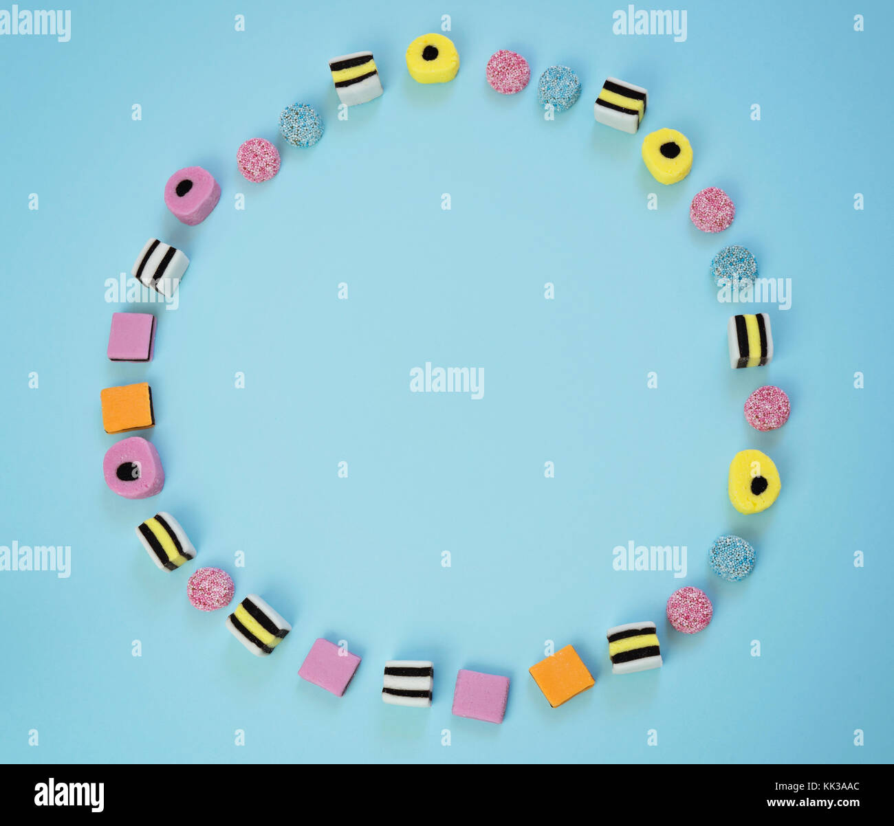 Chewing colored candy lined in the shape of a ring Stock Photo - Alamy