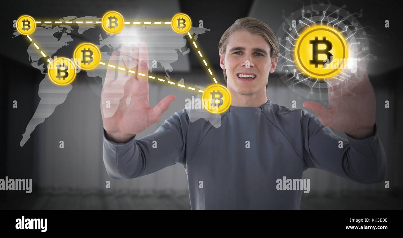 Digital composite of Businessman holding hands up in front of bitcoin ...