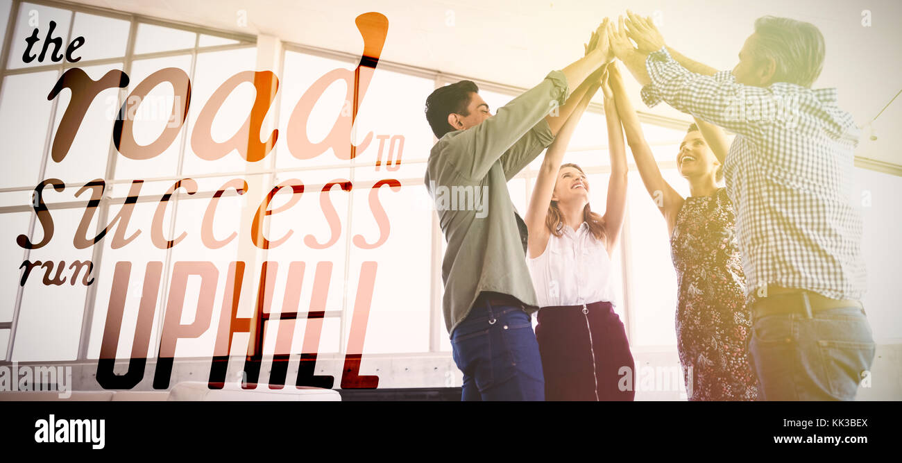 The road to success run uphill against business people raising hands at ...