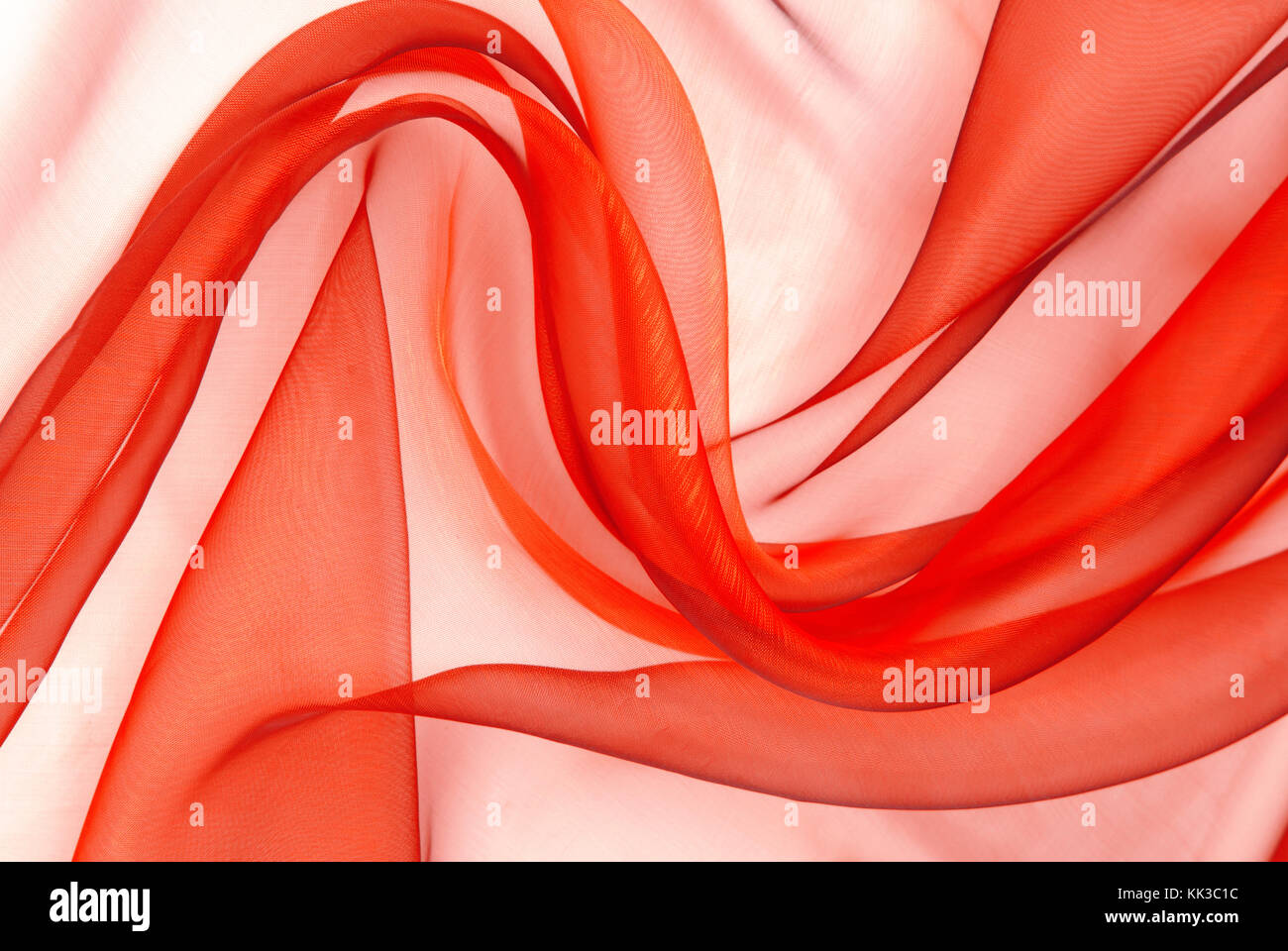 red organza fabric wavy texture Stock Photo - Alamy