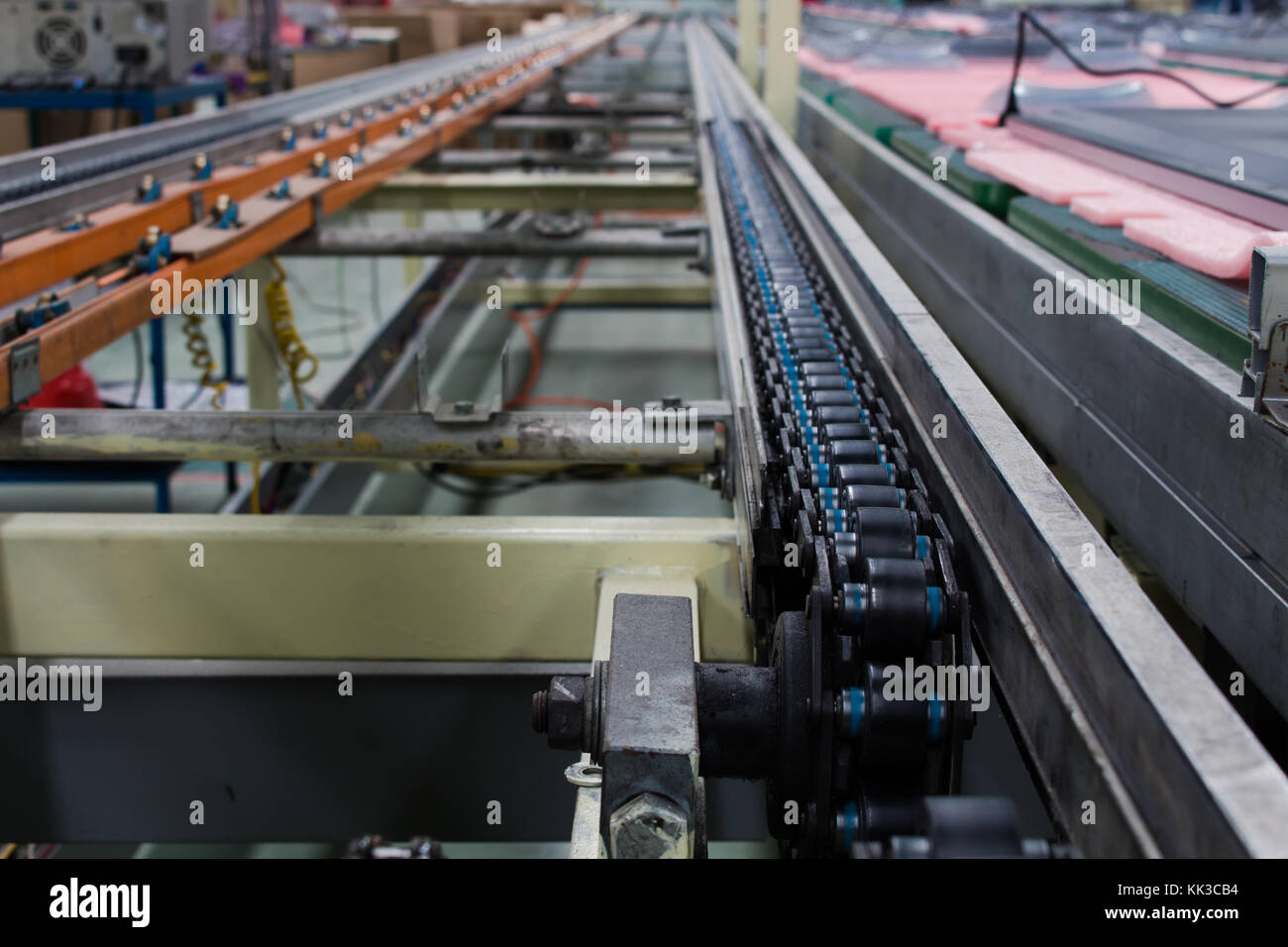 The chain and shaft drive Line Conveyor Stock Photo - Alamy