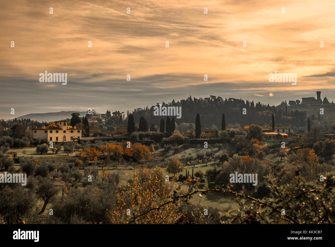 Countryside farms in Toskana, Italy at sunset with cypresses trees and ...