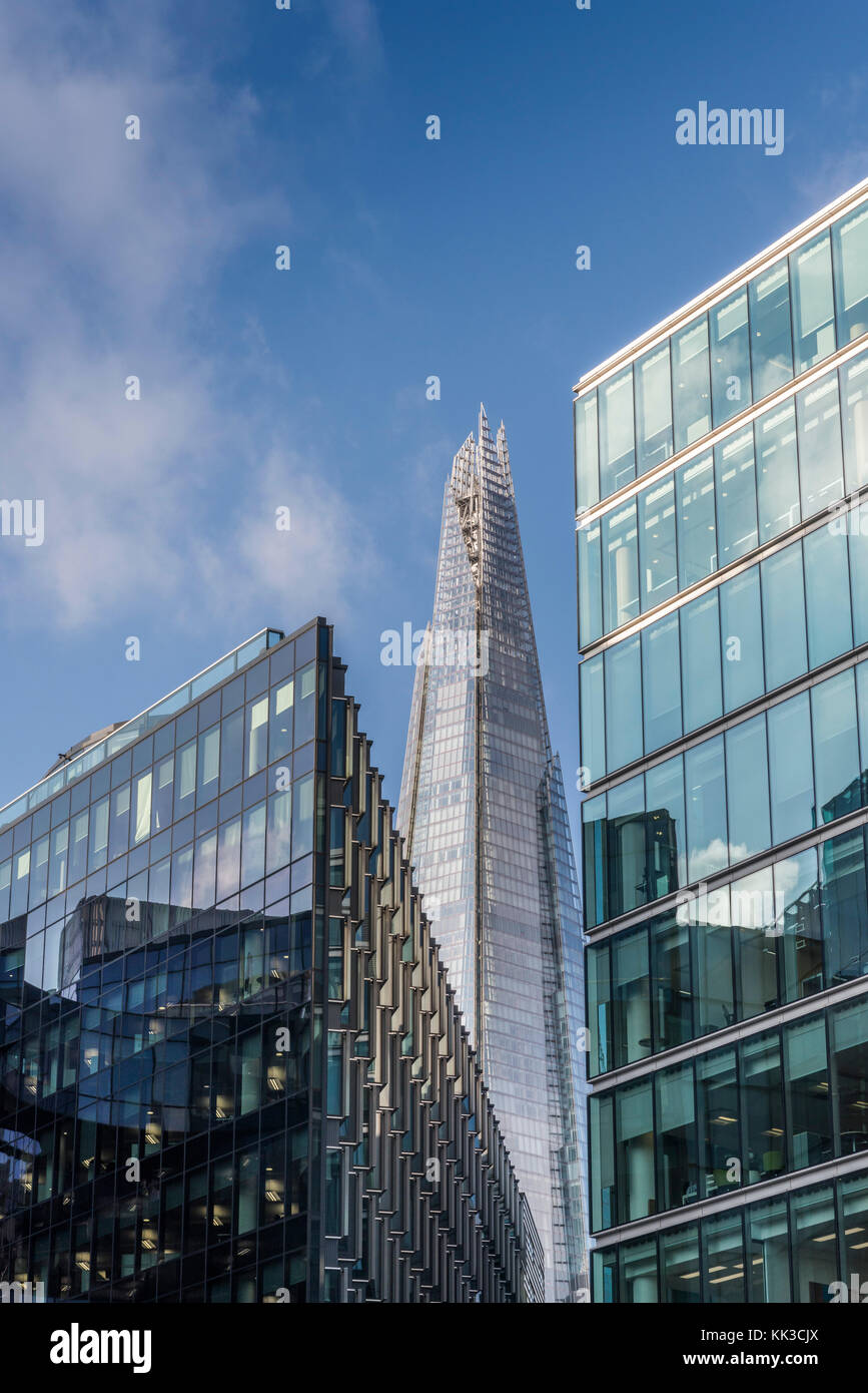 Modern glass buildings, including the Shard on South side of London, UK ...