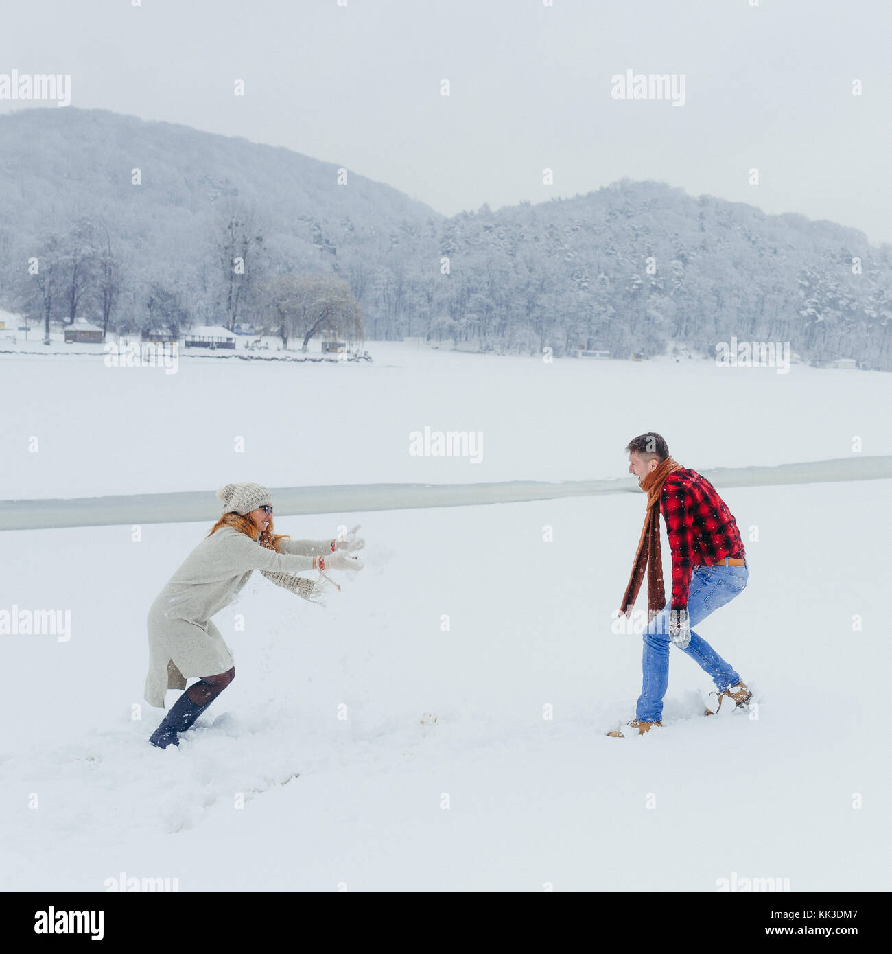Loving Couple Having Fun Throwing Snow Balls Snowy Meadow Forest Winter ...
