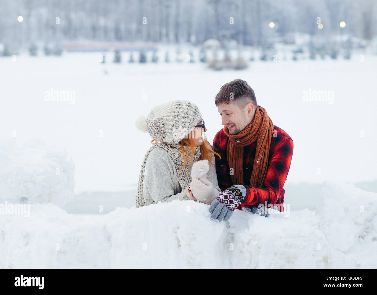 Close-up horizontal portrait of the happy beautiful couple funnily ...