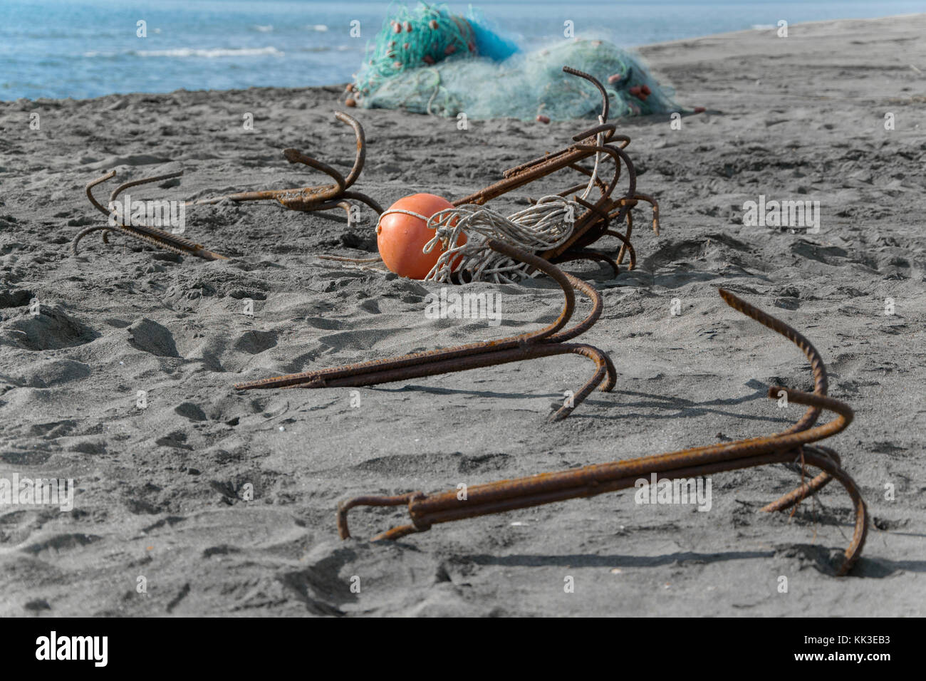 Boats anchors on the sandy beach Stock Photo - Alamy