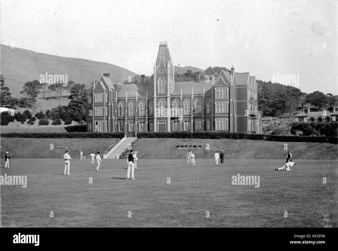 Wellington College with cricket game in progress, ca 1900 Stock Photo ...