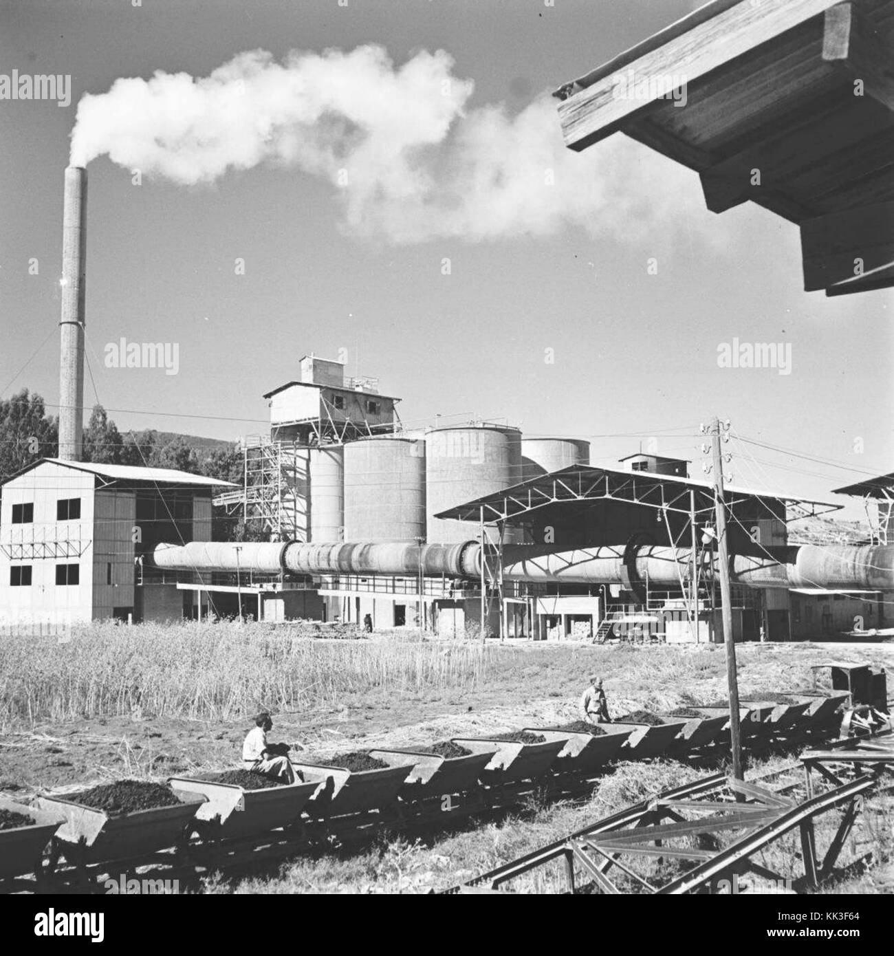 Factory workers in white Black and White Stock Photos & Images - Alamy