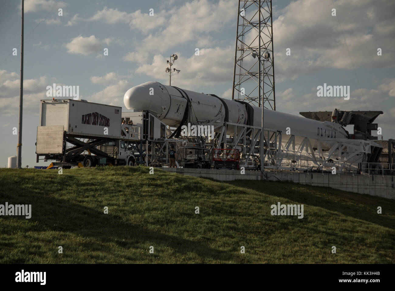 The day before launch, Dragon was loaded with late load cargo in ...