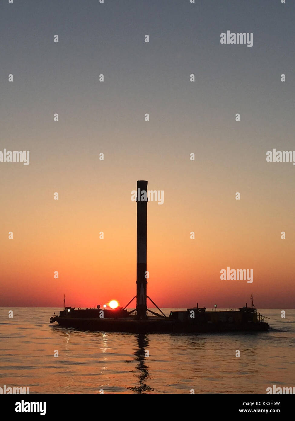 The first stage of the Falcon 9 that launched JCSAT-14 on its way back ...