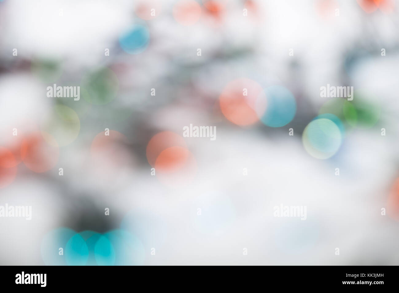 Abstract bokeh background from multi-colored spots on a light Stock ...