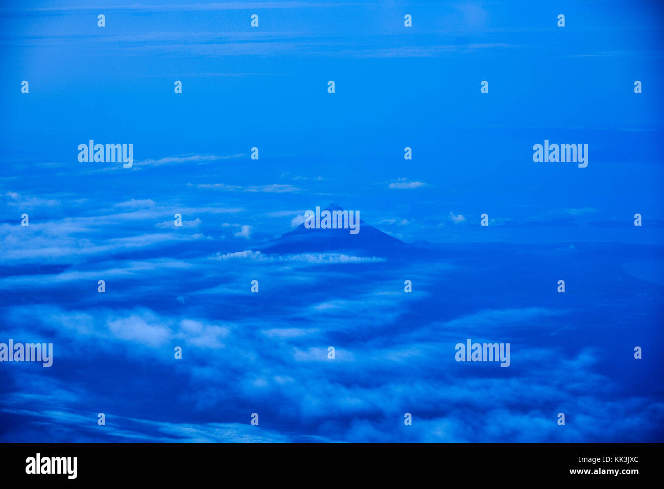 View from a plane at 32 thousand feet of the world's perfect cone ...