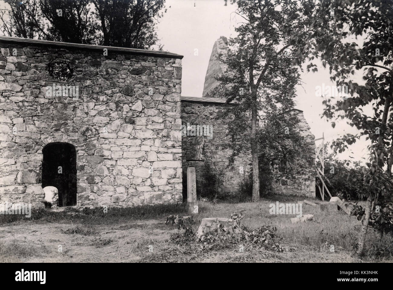 The image shows the Nes church ruins, located in Akershus, Norway, as ...