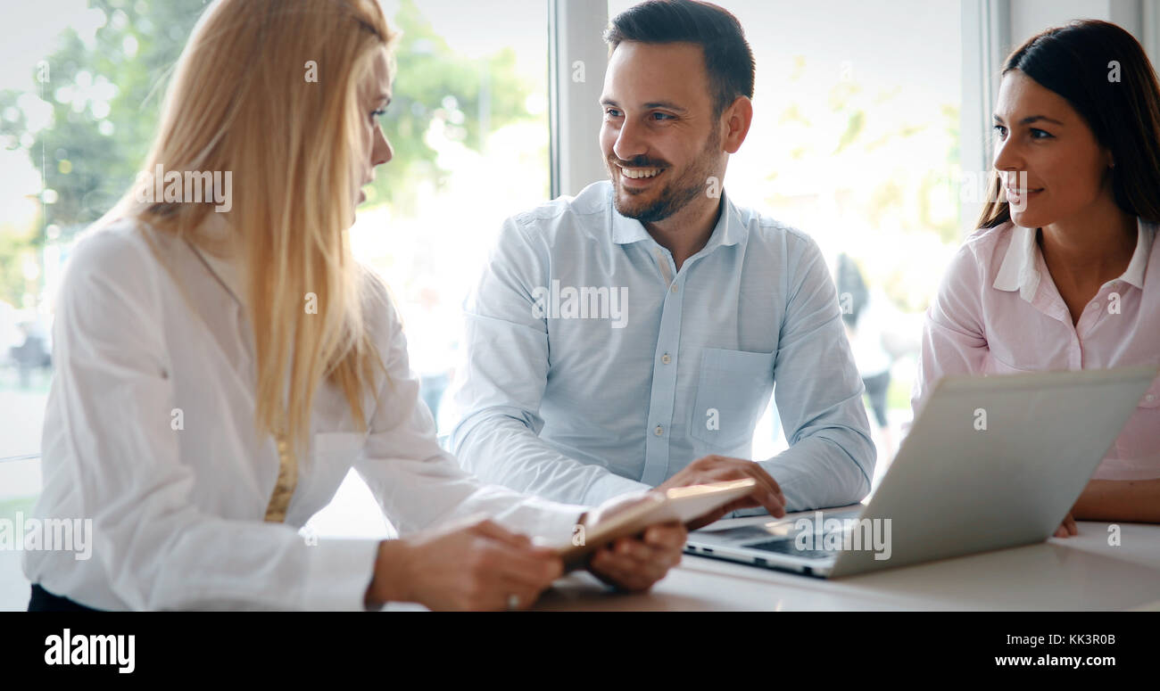Business colleagues laughing Stock Photo - Alamy