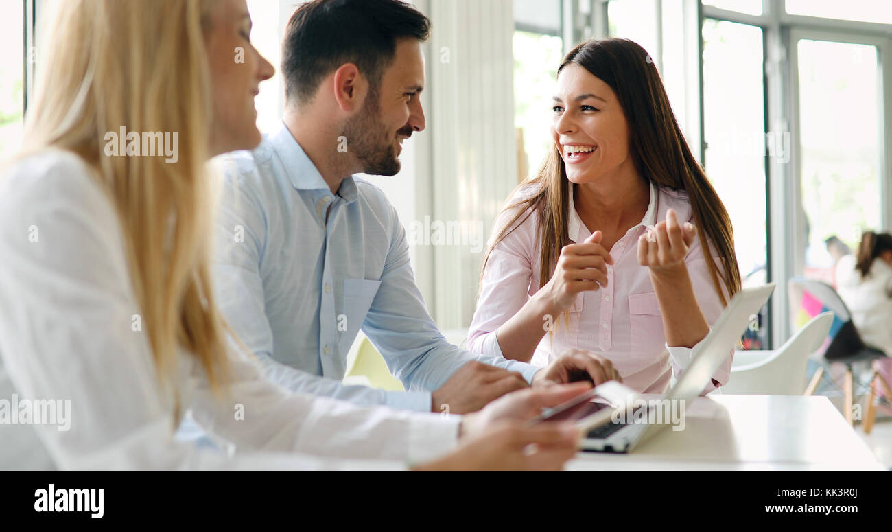 Business colleagues laughing Stock Photo - Alamy