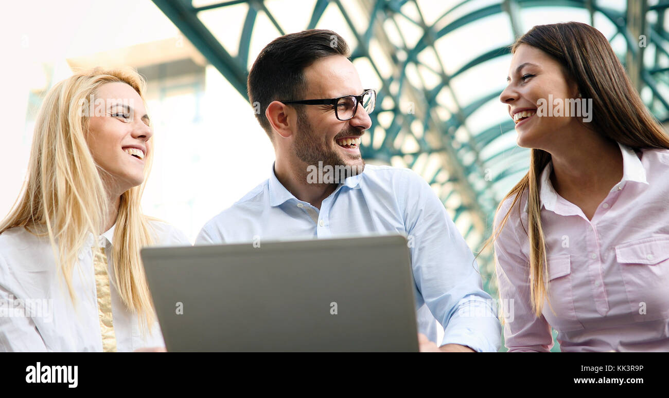 Business colleagues laughing Stock Photo - Alamy