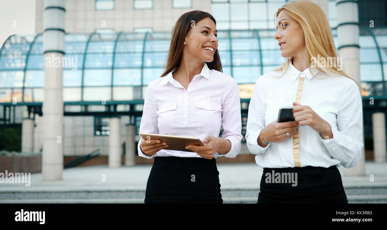 Picture of two young beautiful women as business partners Stock Photo ...