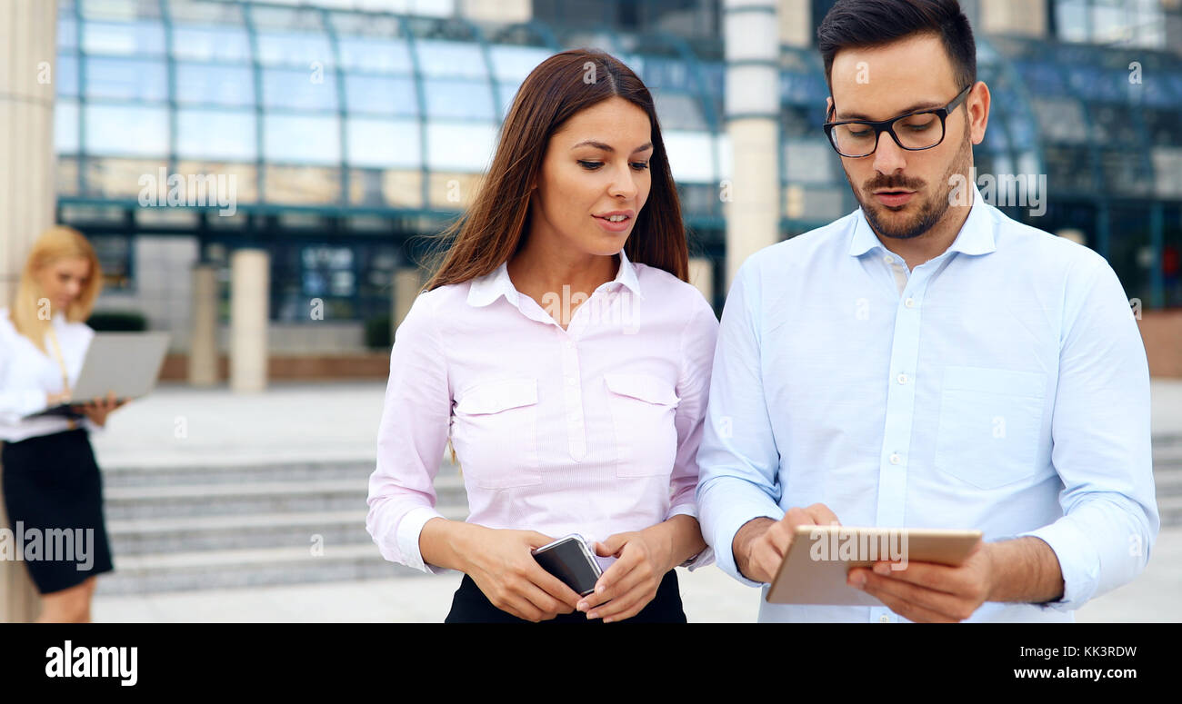 Happy business colleagues in modern office Stock Photo - Alamy