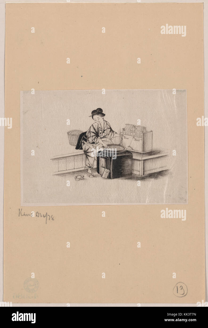 This image depicts a woman spinning silk, capturing a traditional ...