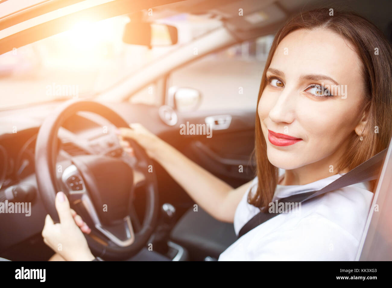 Portrait confident woman driving car hi-res stock photography and ...