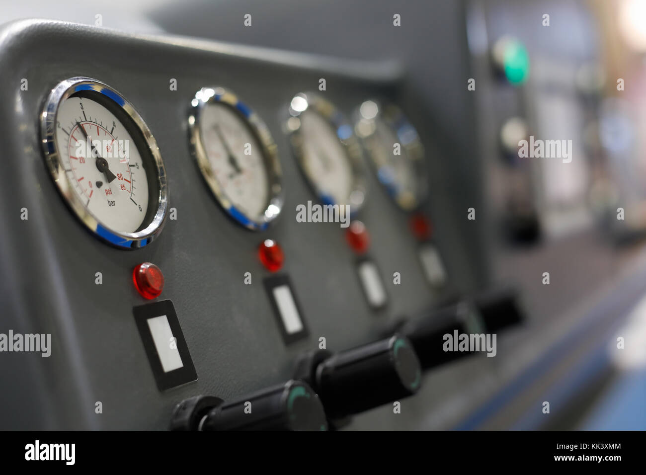 Analog manometers on a control panel of industrial machine. Selective ...