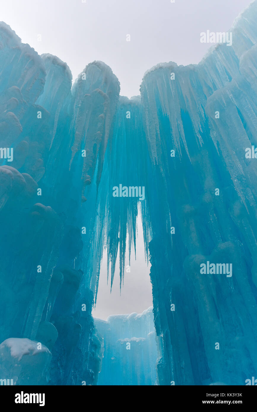 Translucent blue icicles in a frozen ice wall Stock Photo - Alamy