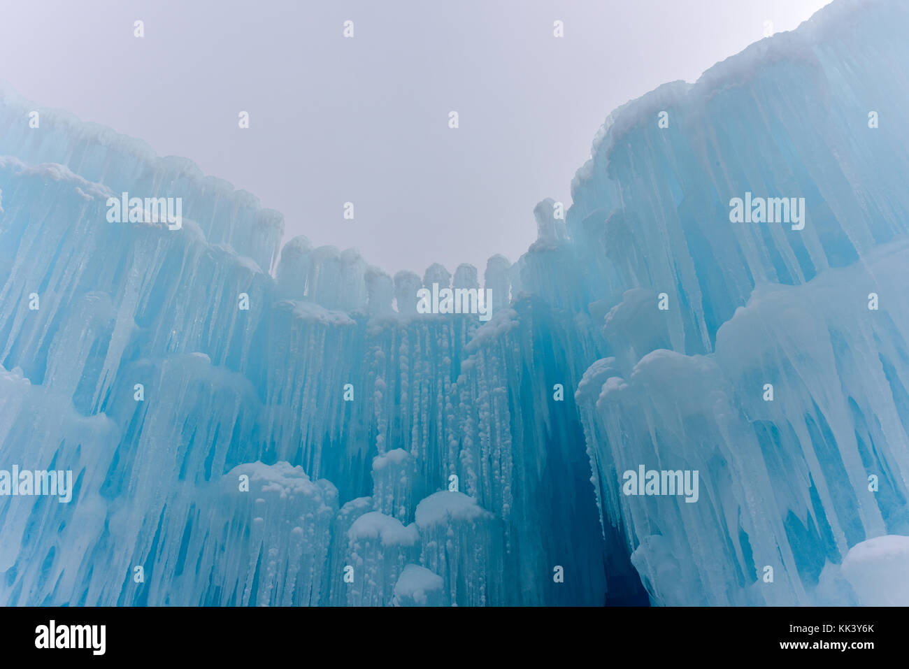 Translucent blue icicles in a frozen ice wall Stock Photo - Alamy