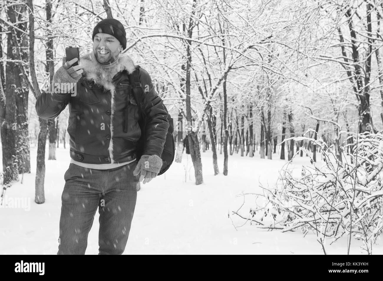 A man in winter clothes on the street Stock Photo - Alamy