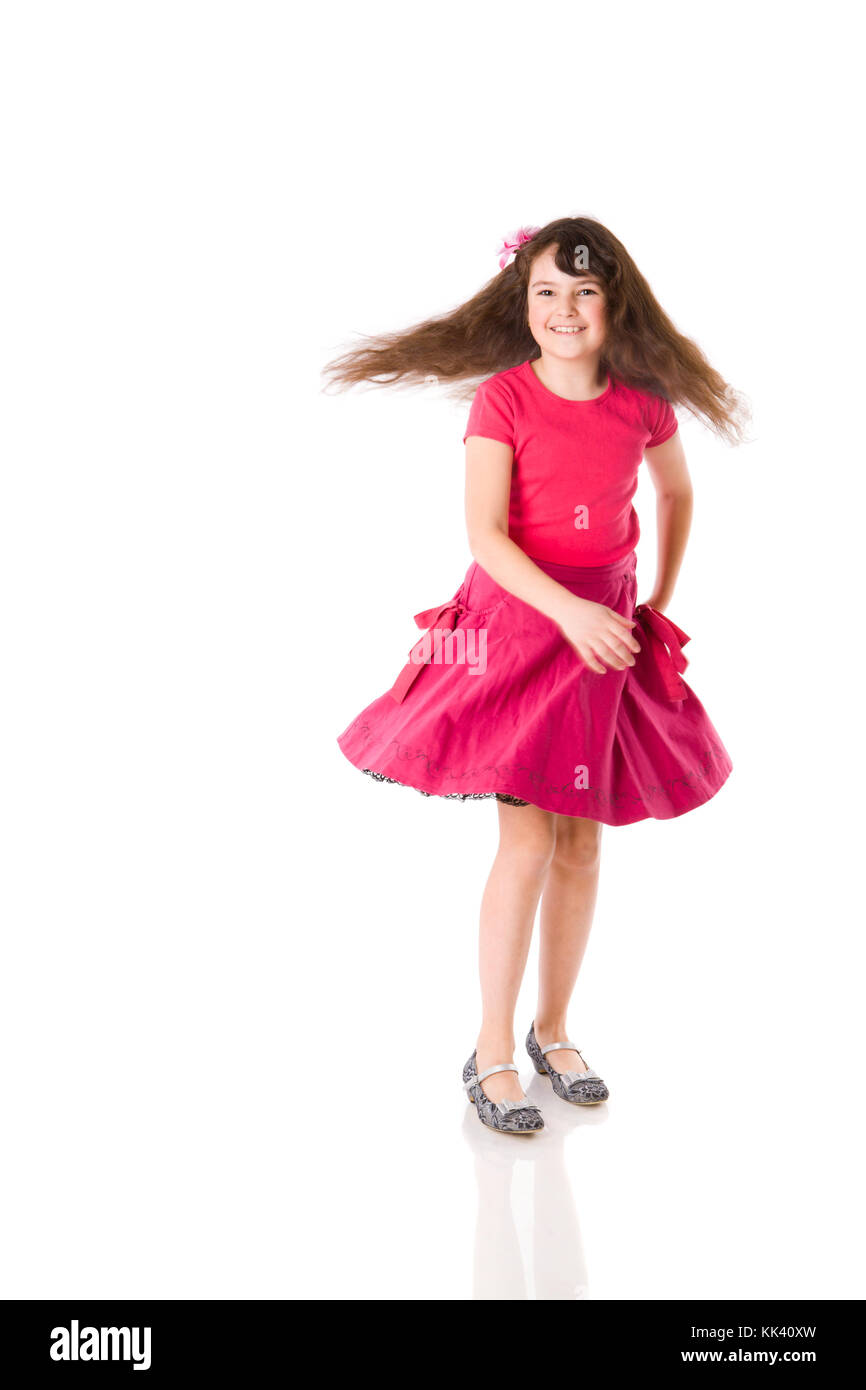 Cheerful girl dancing on floor isolated on white Stock Photo - Alamy