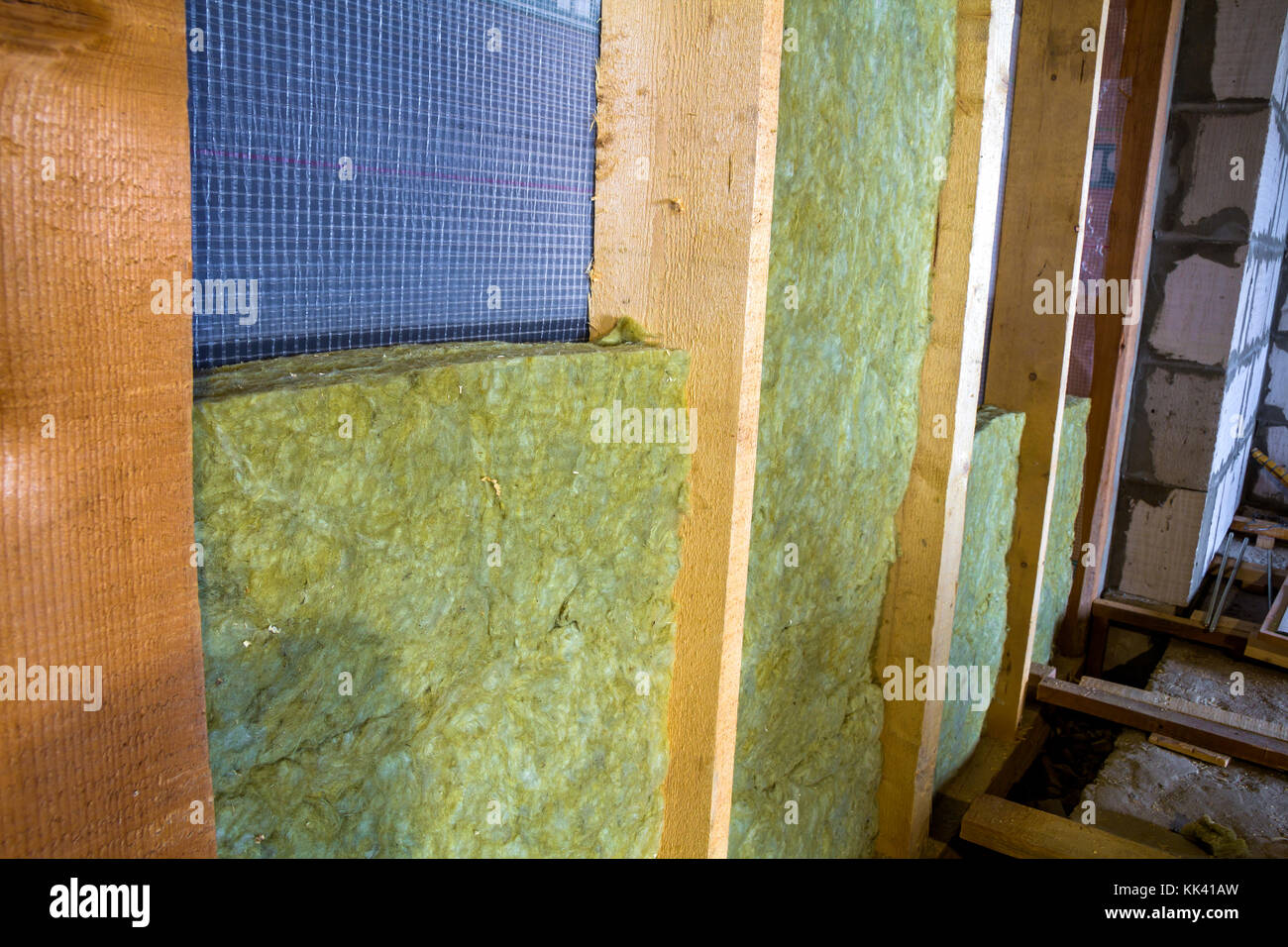 Thermal insulation mineral rock wool installation at the new building ...