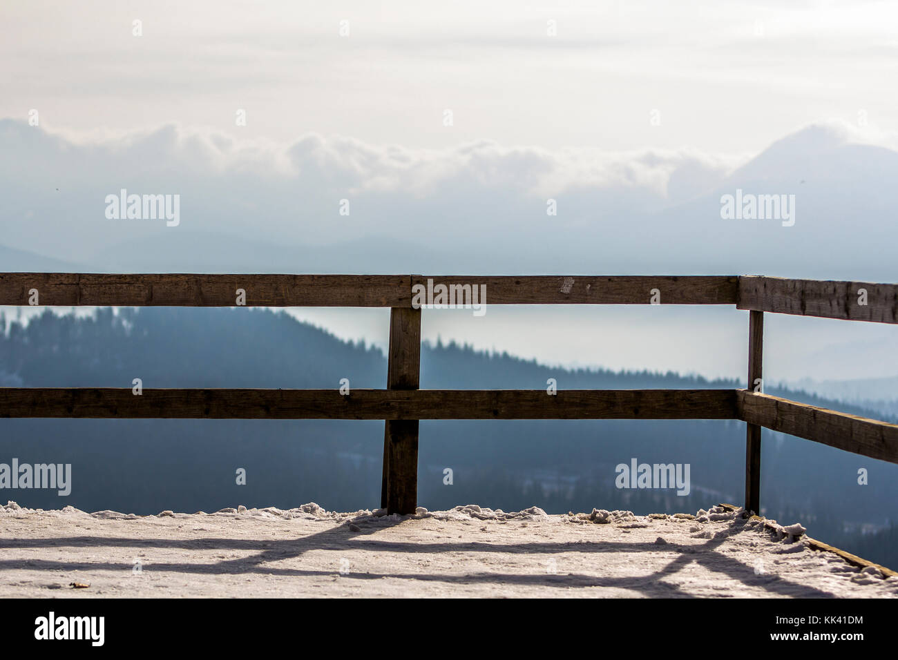 Wooden boards railing in winter mountains Stock Photo - Alamy