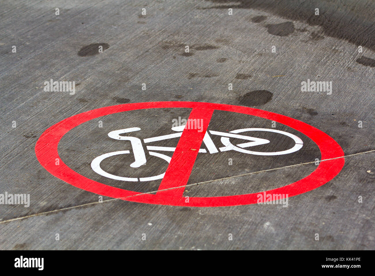 End of bicycle lane sign on the asphalt road surface Stock Photo - Alamy