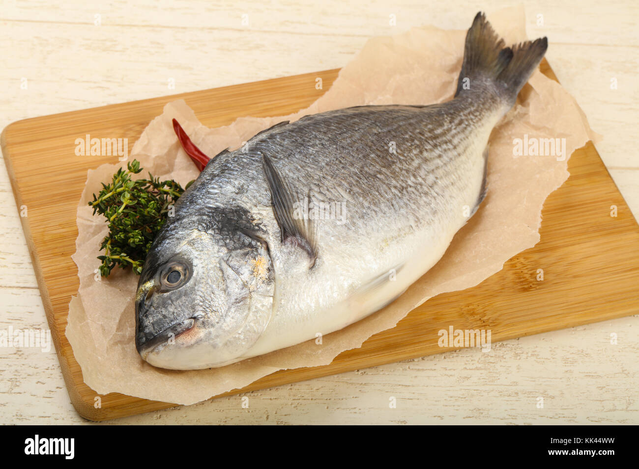 raw dorada fish - ready for cooking Stock Photo - Alamy