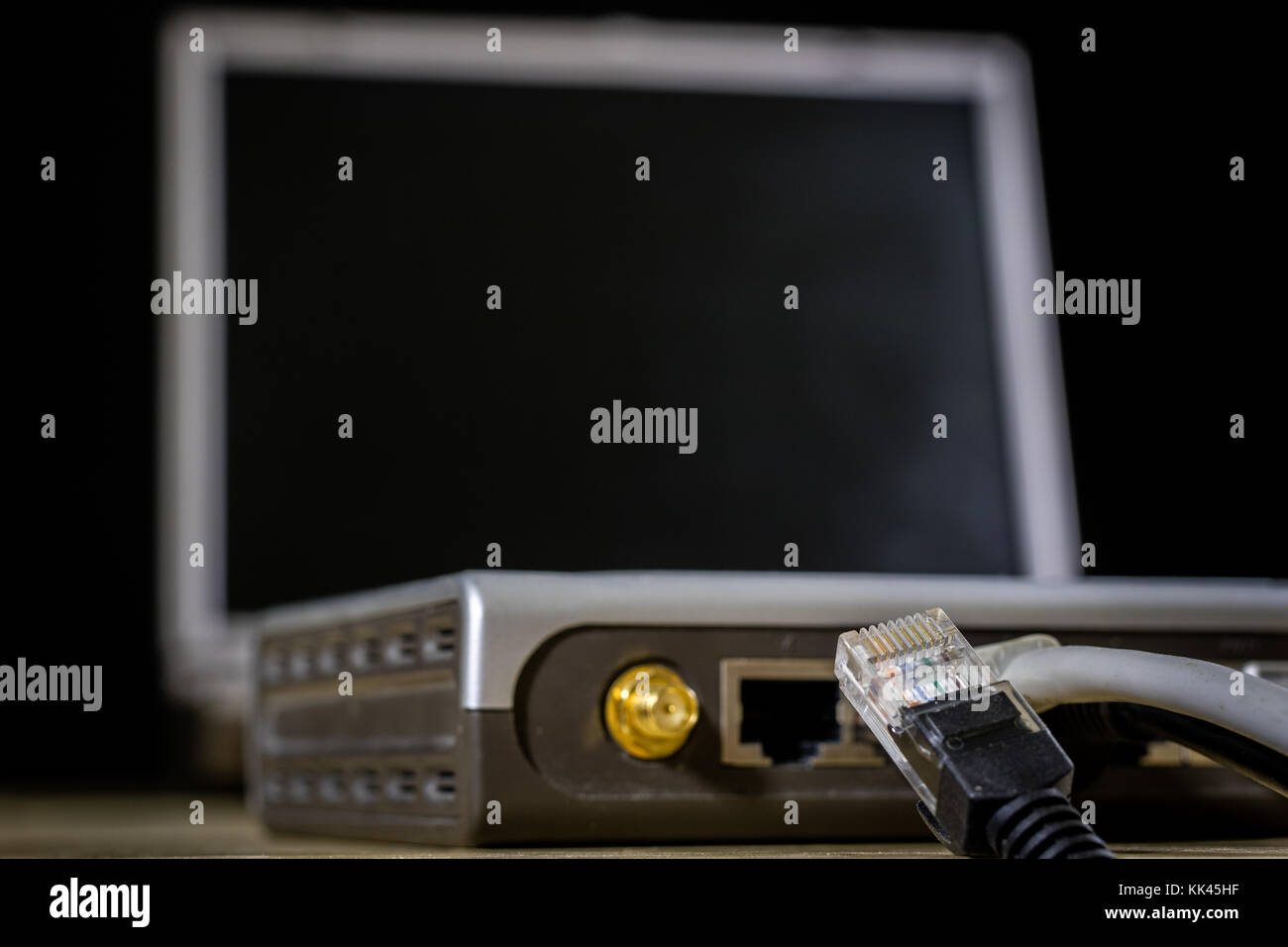 Network hub and rj45 cables on the stage. Computer accessories used in ...