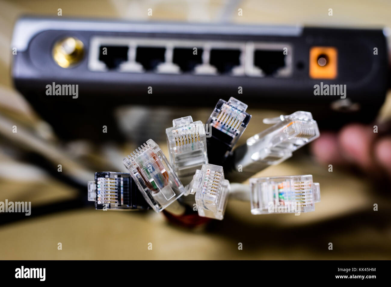 Network hub and rj45 cables on the stage. Computer accessories used in ...