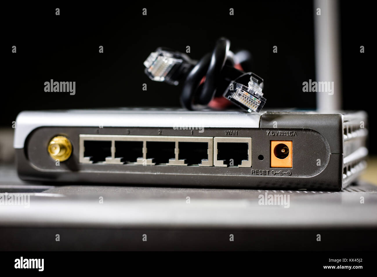 Network hub and rj45 cables on the stage. Computer accessories used in ...