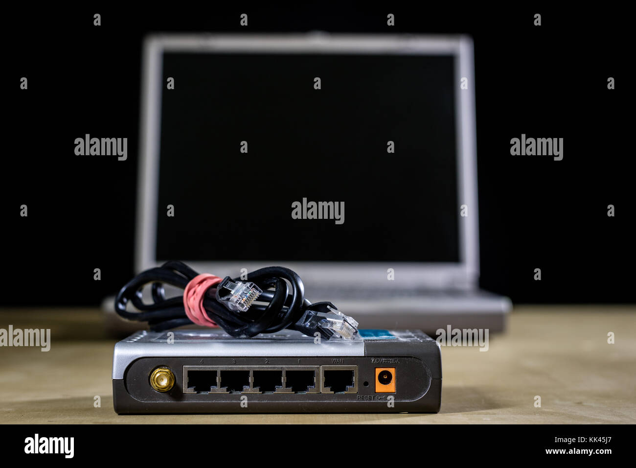 Network hub and rj45 cables on the stage. Computer accessories used in ...