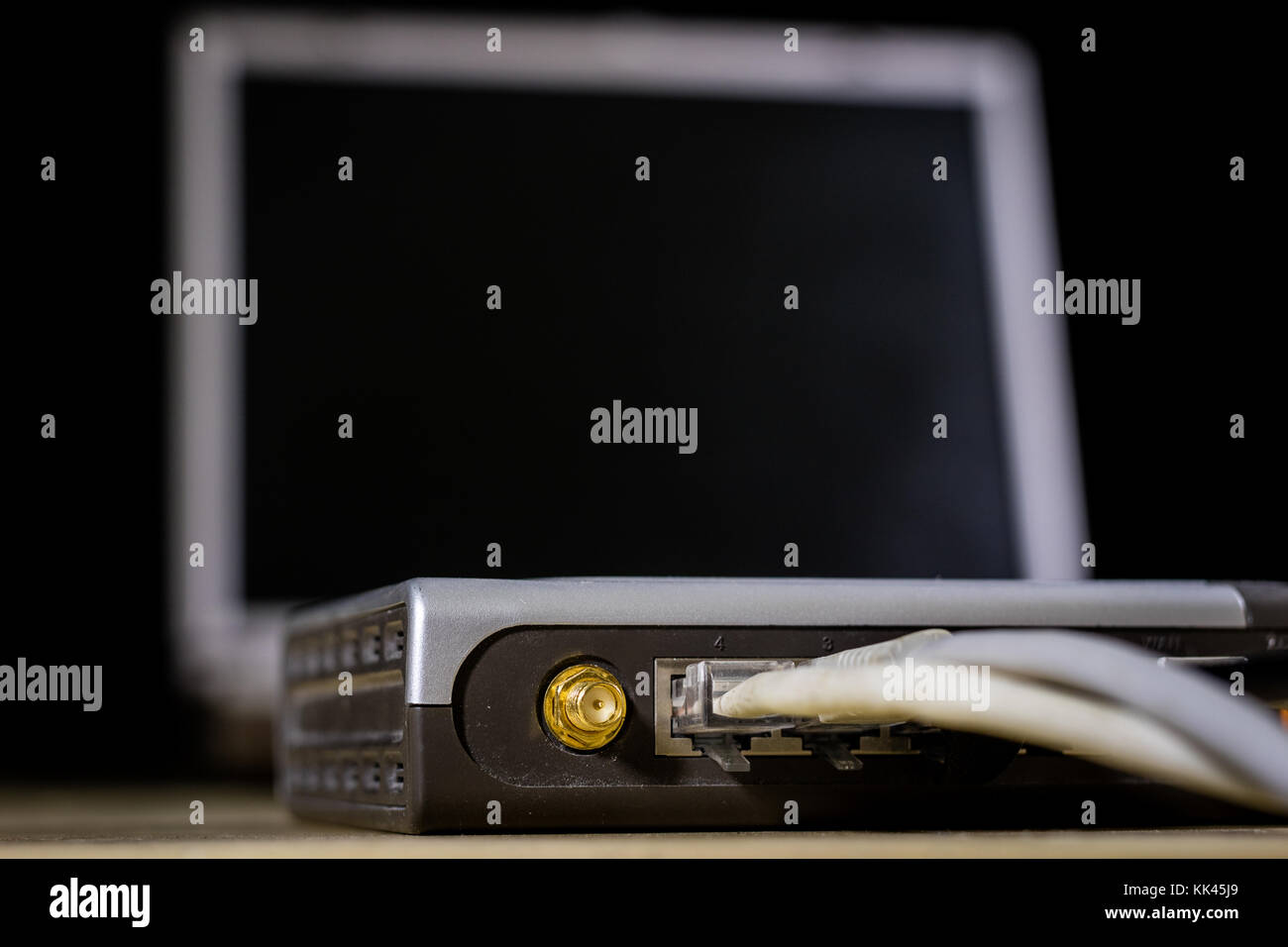 Network hub and rj45 cables on the stage. Computer accessories used in ...