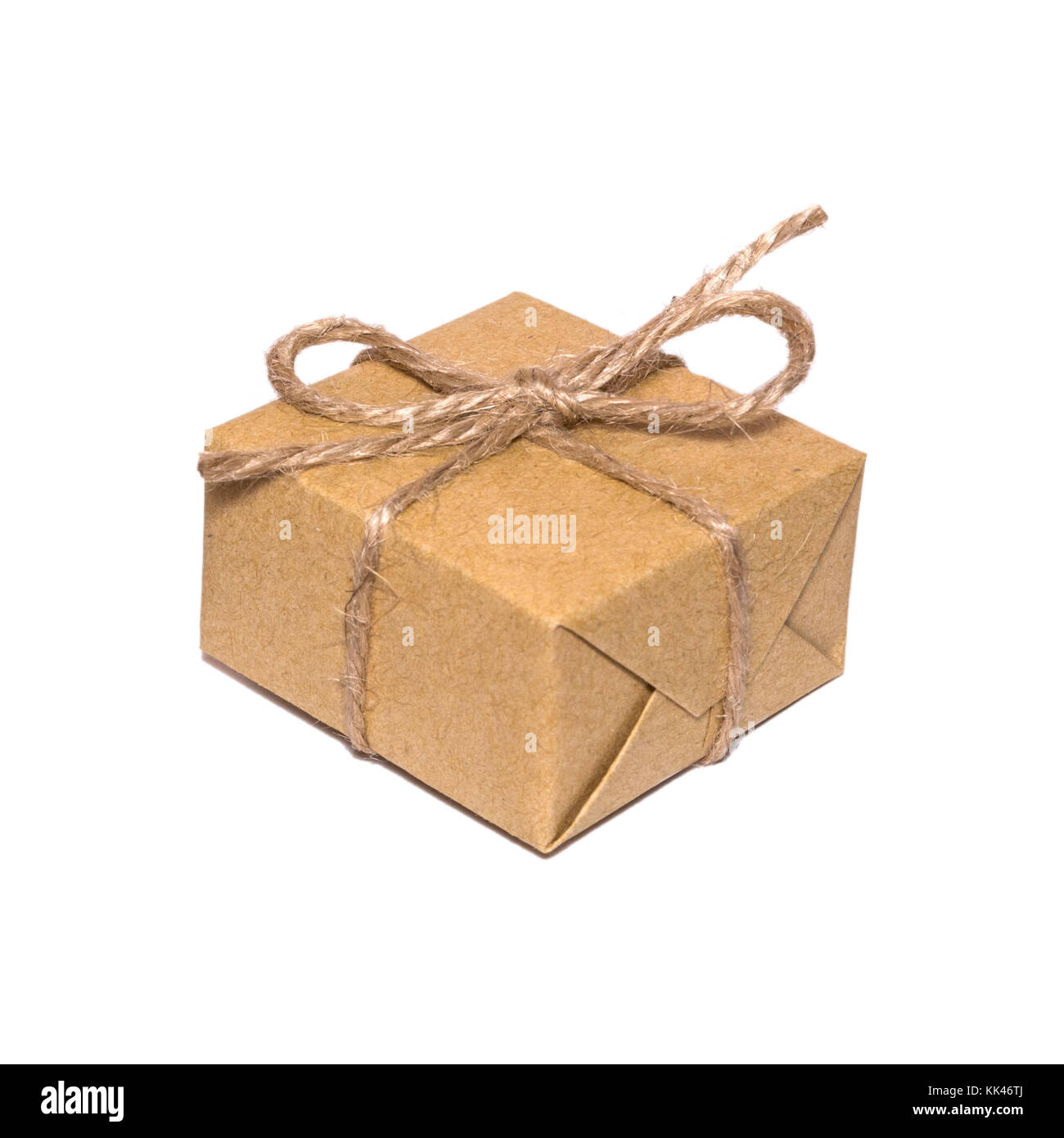 Gift box wrapped in kraft paper isolated on white background Stock ...