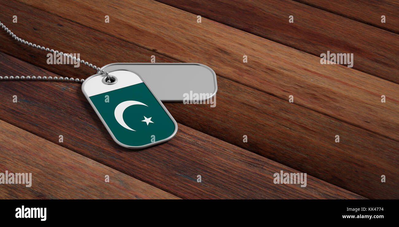 Pakistan army concept, Pakistan flag identification dog tags on wooden ...
