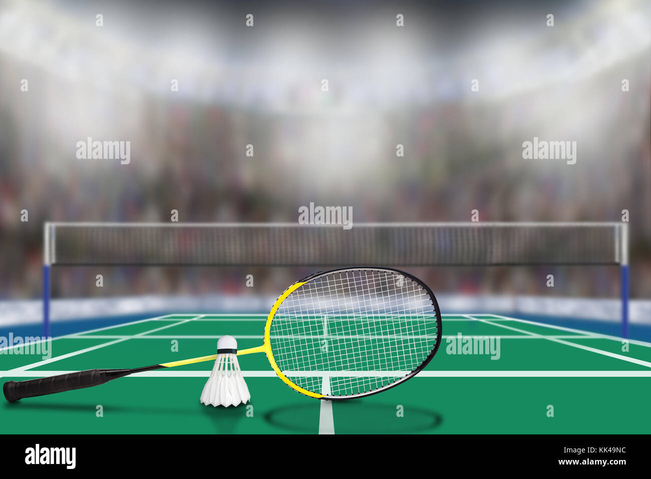 Low angle view of badminton racket and shuttlecock in arena with sports ...